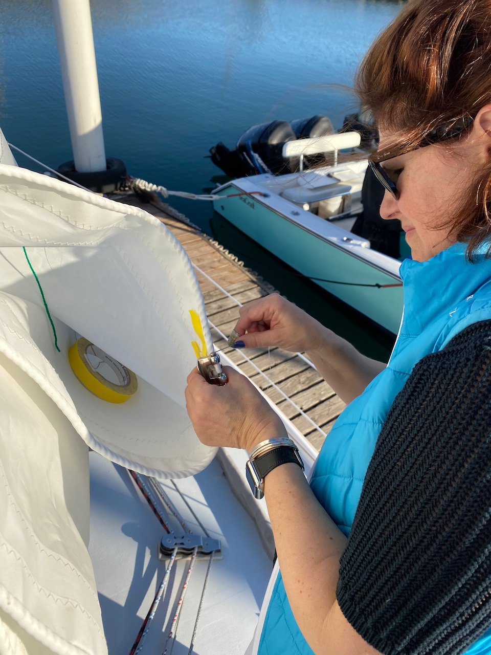 Mending main sail – "Bold Flight"