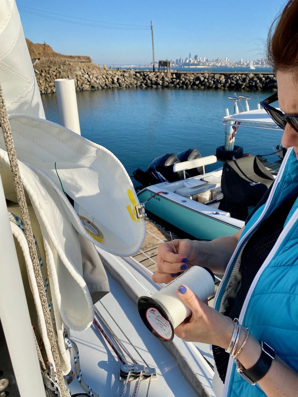 Mending main sail – "Bold Flight"